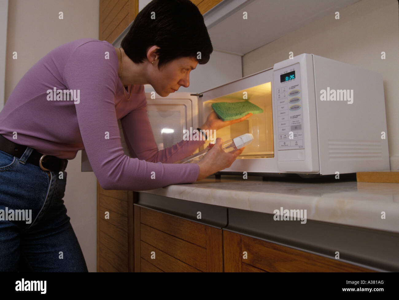 Cleaning ovens hi-res stock photography and images - Alamy