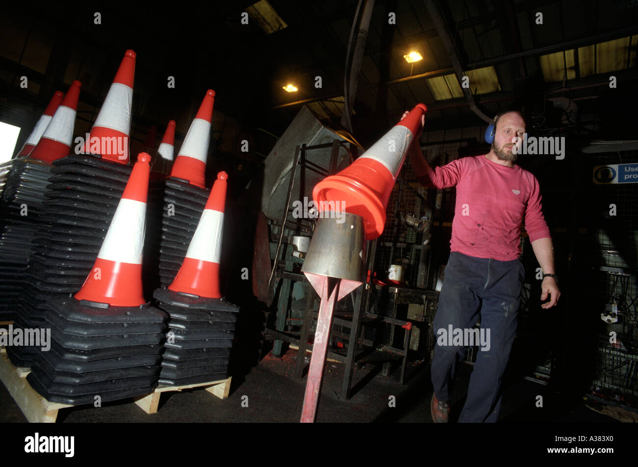 Traffic cones being manufactured Stock Photo - Alamy
