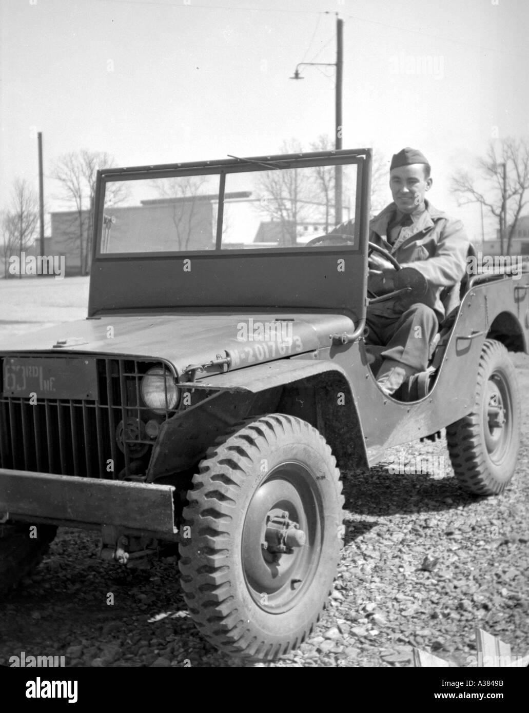 WW II Jeep and GI George Looney Collection Stock Photo - Alamy