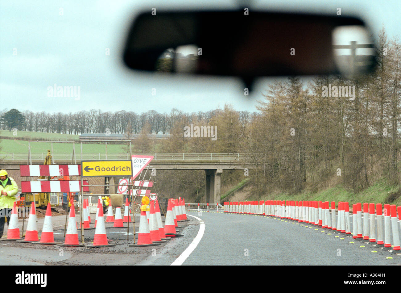 Traffic cones creating a contra flow on a highway Stock Photo - Alamy