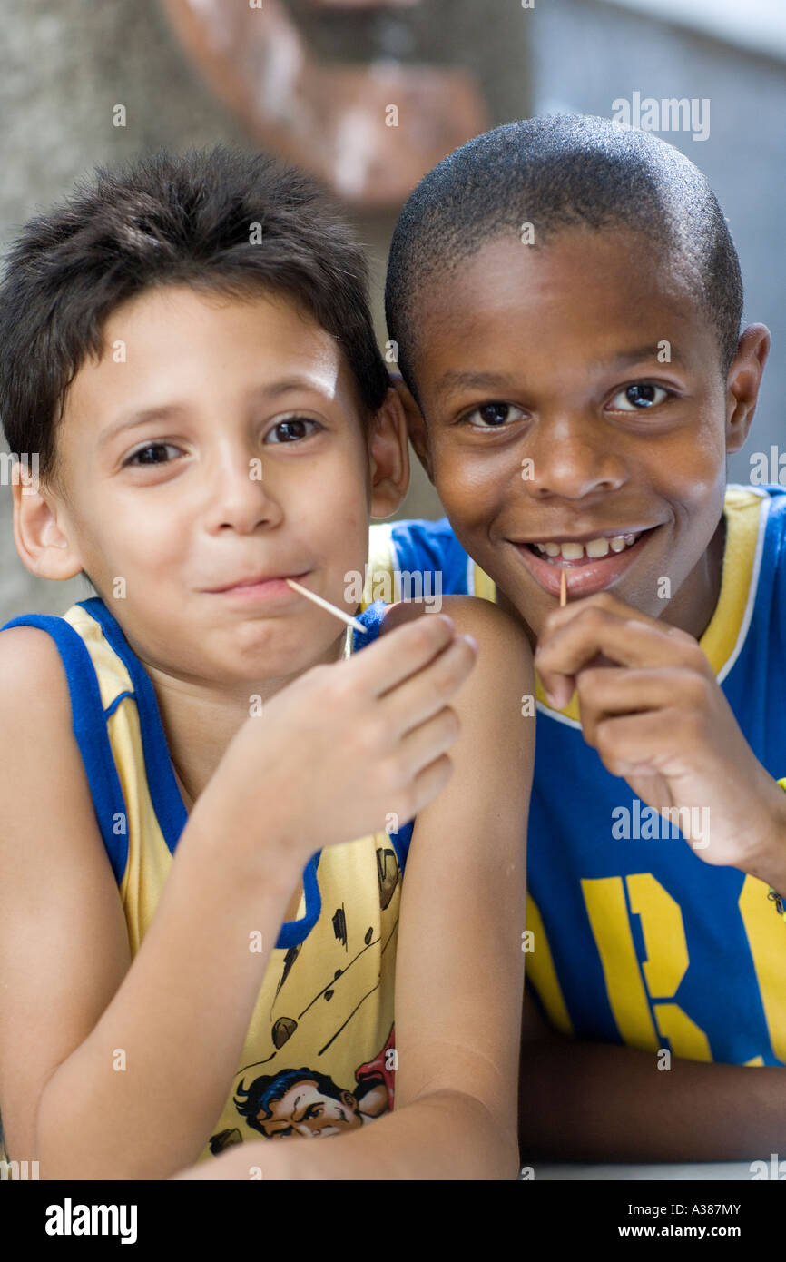 Two friends smile for the camera Stock Photo - Alamy