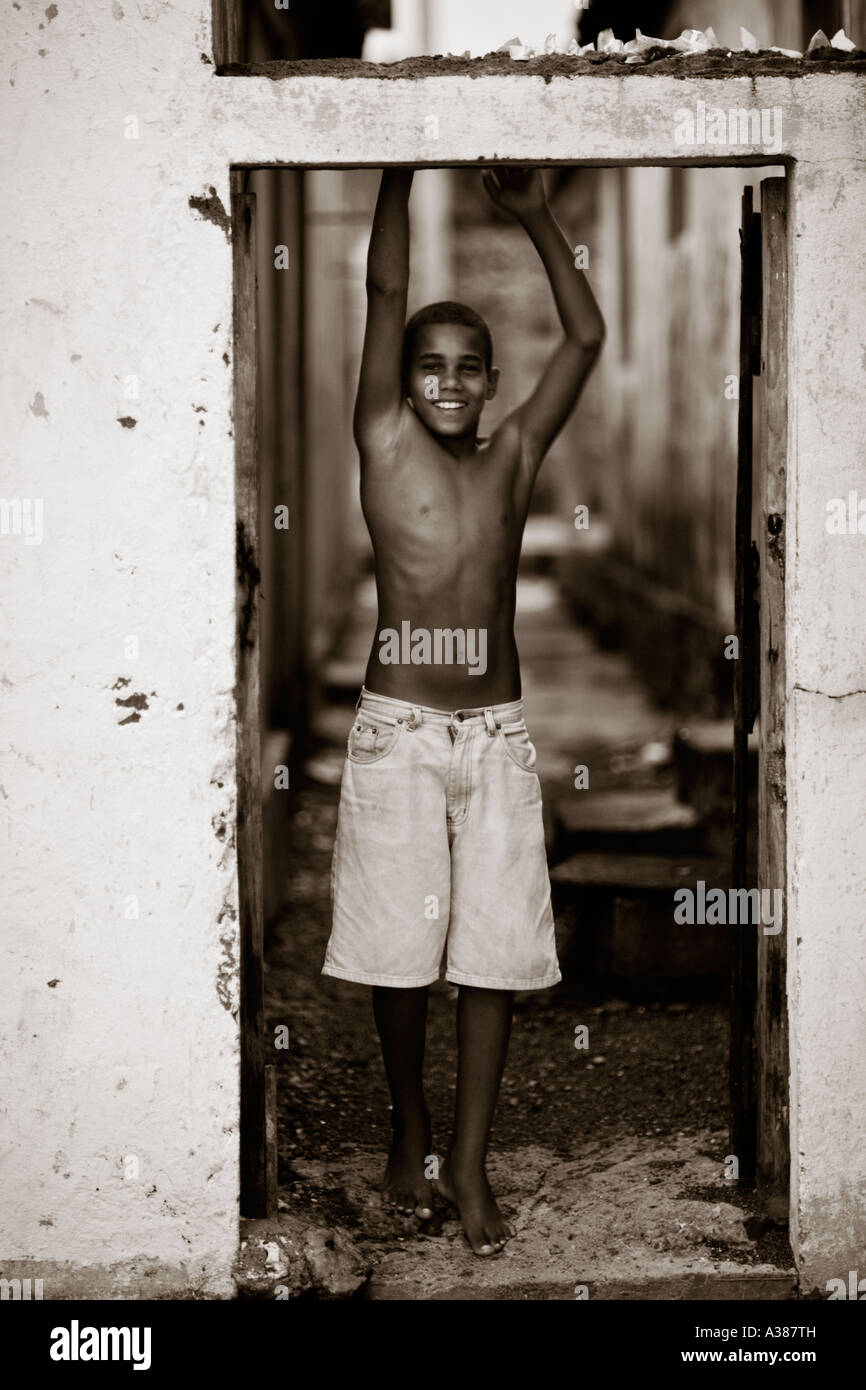 Baracoa Cuba A sepia toned image of a Cuban boy hanging out in a ...