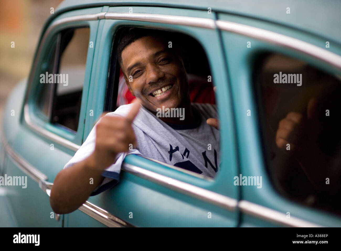 A Cuban man gives me the thumbs up Stock Photo - Alamy