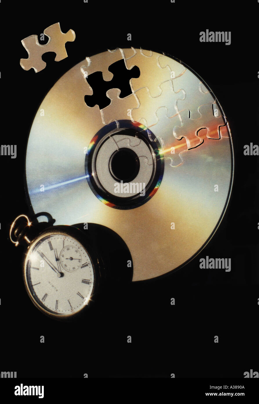 CD puzzle and pocket watch Stock Photo - Alamy