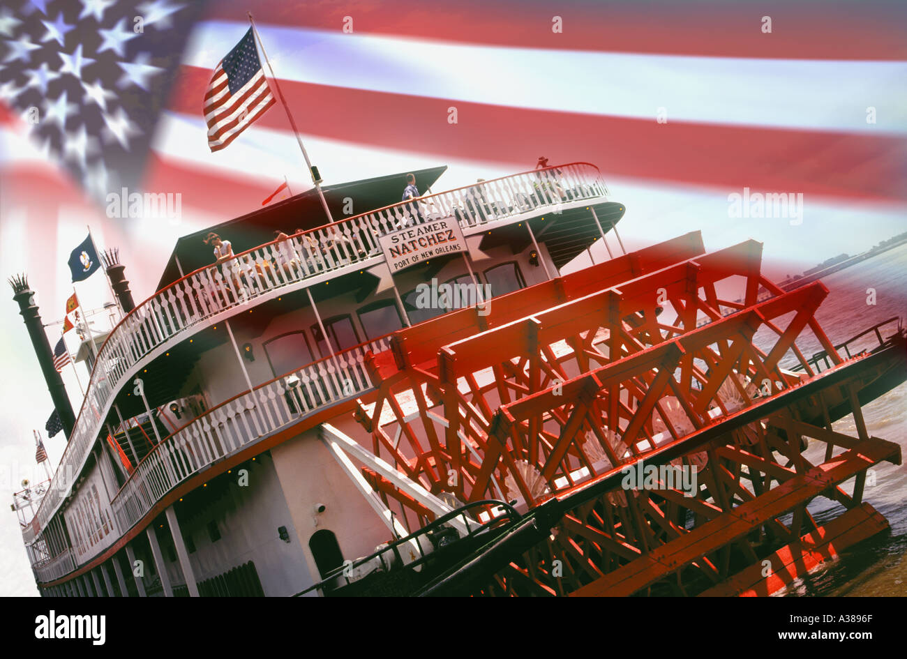 US flag and New Orleans paddle steamer Stock Photo - Alamy