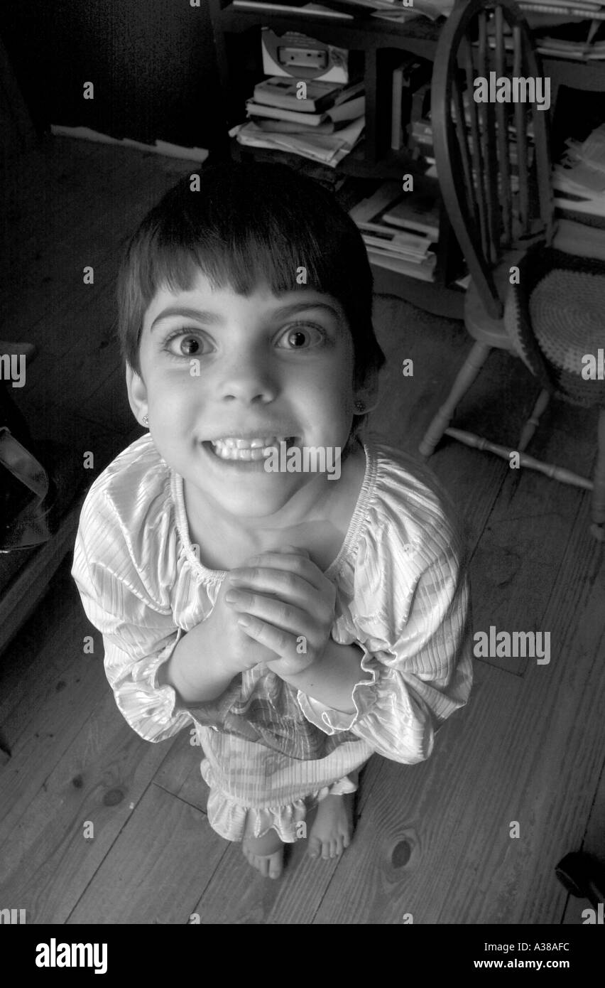 young girl with excited pleased expression Stock Photo - Alamy