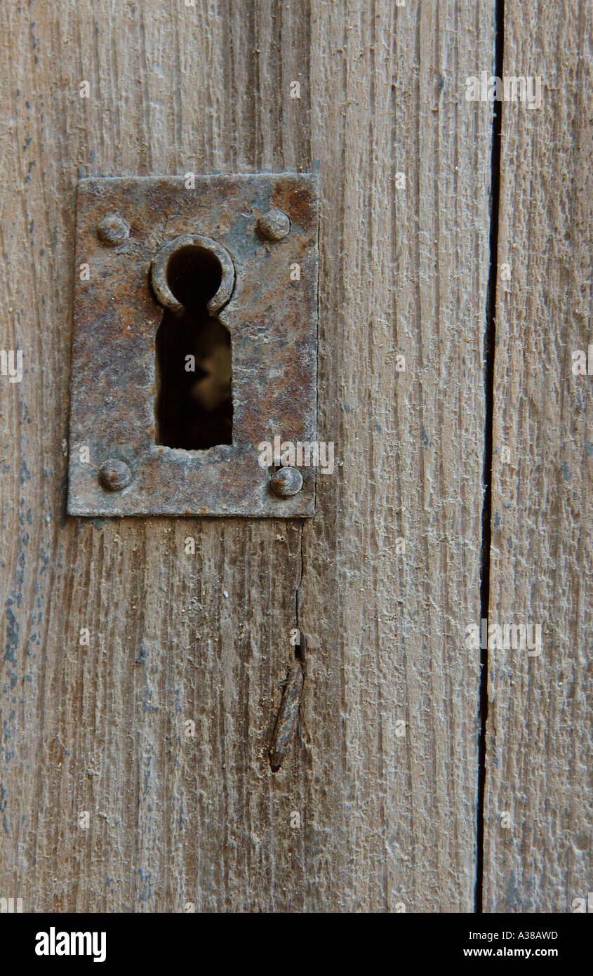 keyhole in old wooden door Stock Photo - Alamy