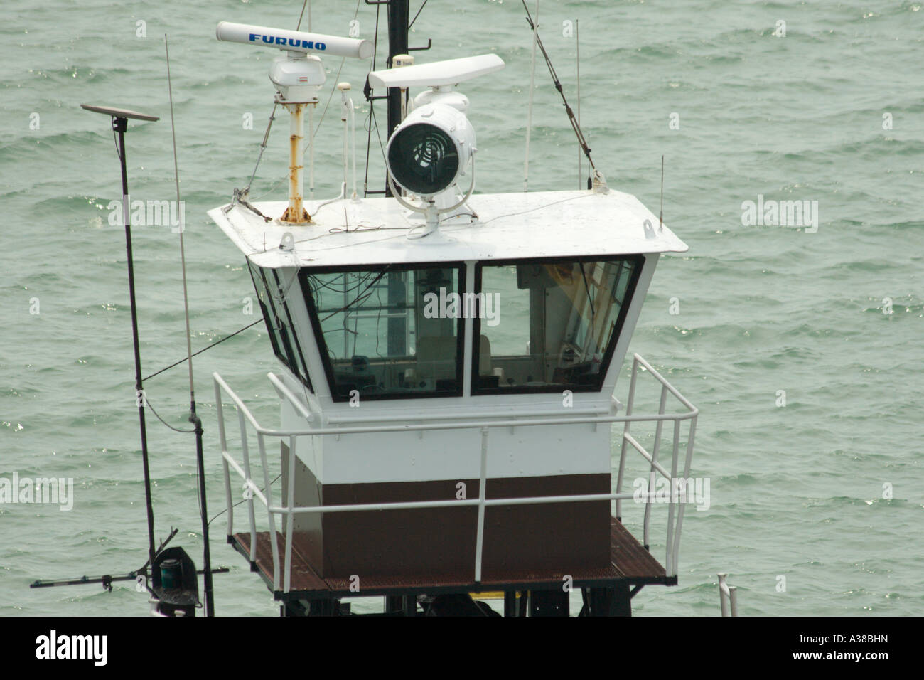 White Tug Boat Elevated Wheel House with Radar Antennae Stock Photo - Alamy