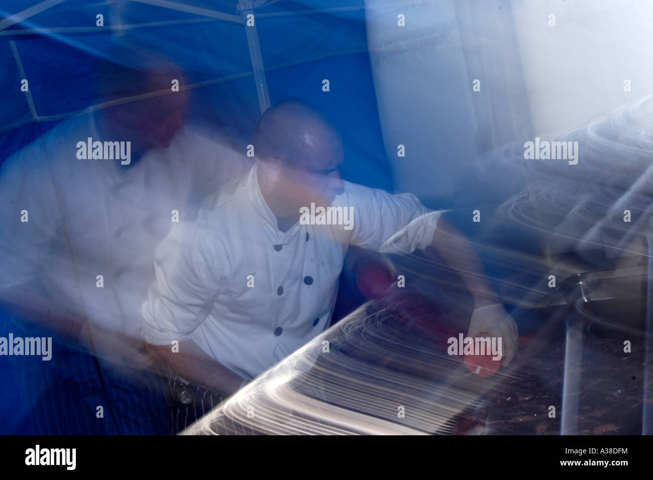 Barbeque chef at a wedding Stock Photo - Alamy