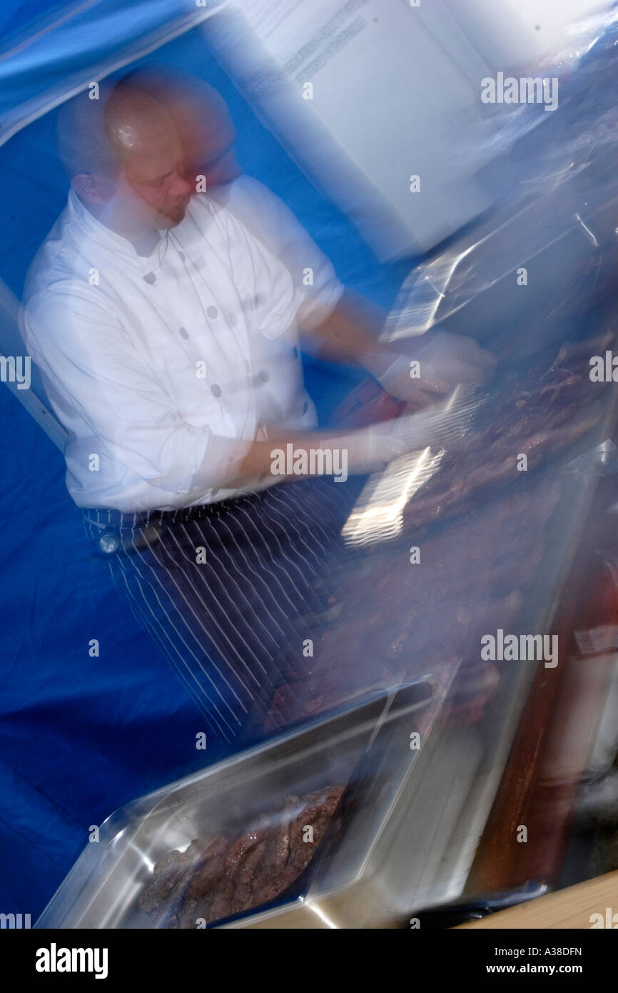 Barbeque chef at a wedding Stock Photo - Alamy