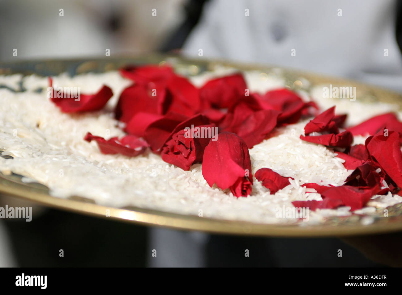 Rice and rose petal confetti for a Greek wedding Stock Photo - Alamy
