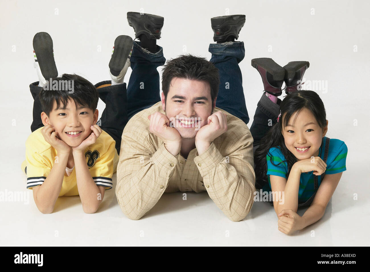 a-english-teacher-and-two-korean-students-stock-photo-alamy