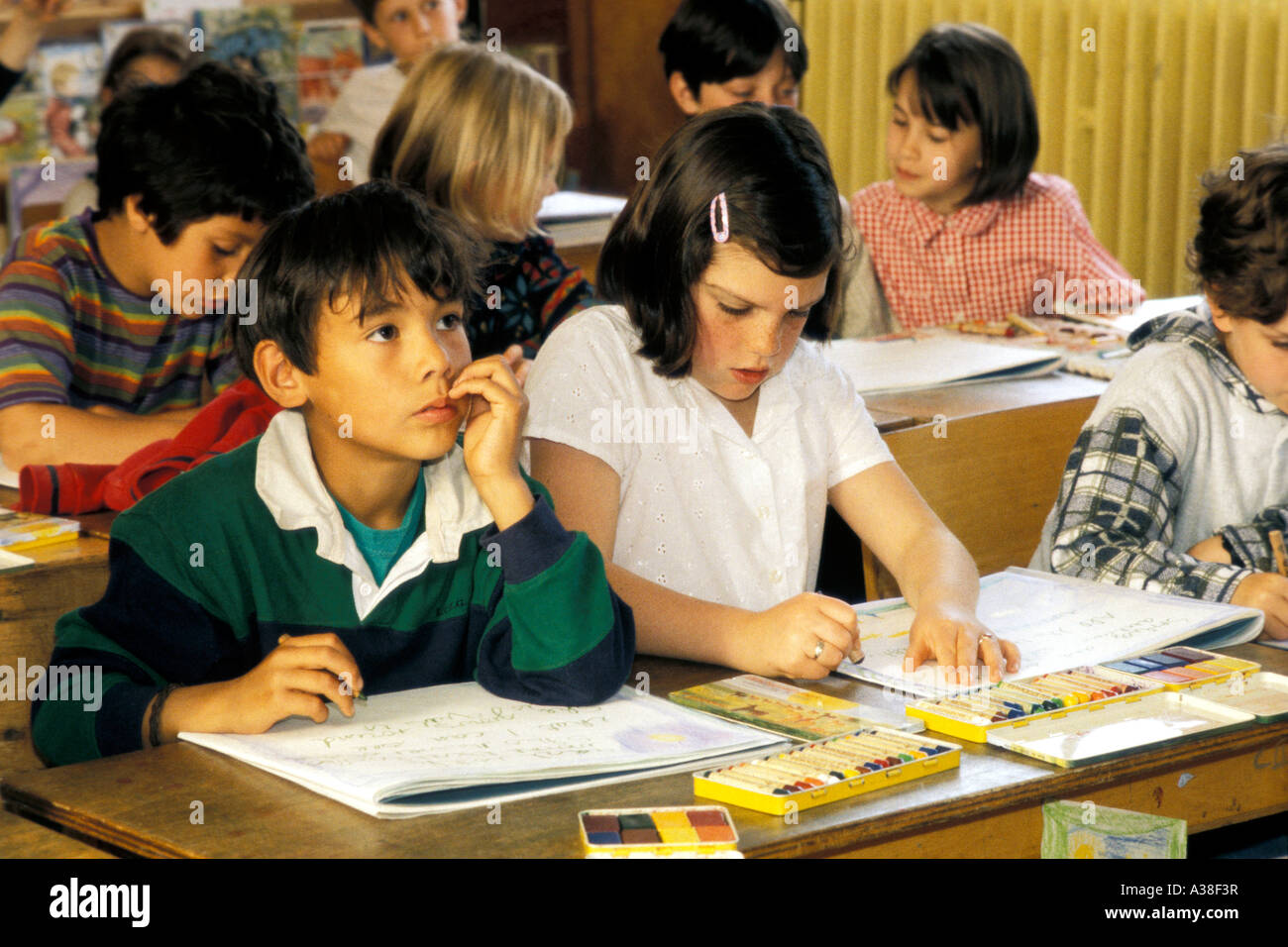 School children working at their desks in main lesson time Michael Hall ...