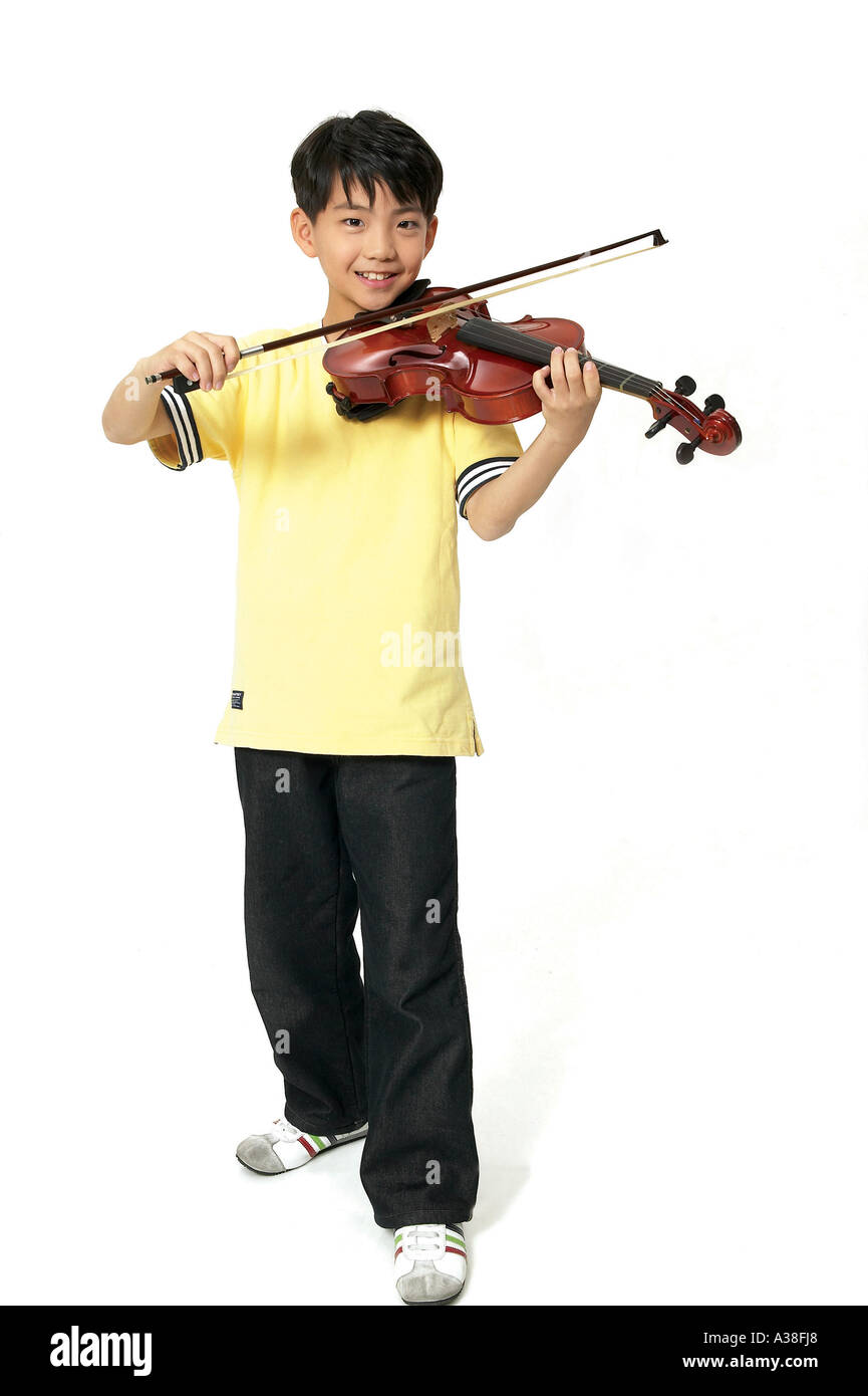 Children playing musical instruments hi-res stock photography and ...