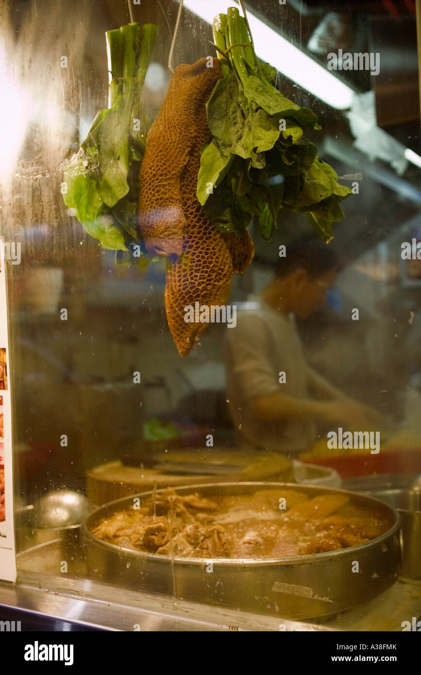 Preparing food in a Dai Pai Dong, Hong Kong Stock Photo - Alamy