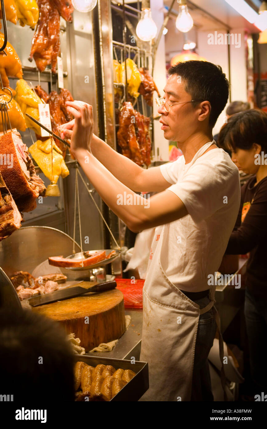 Cooked food stall in Causeway Bay, Hong Kong Stock Photo - Alamy