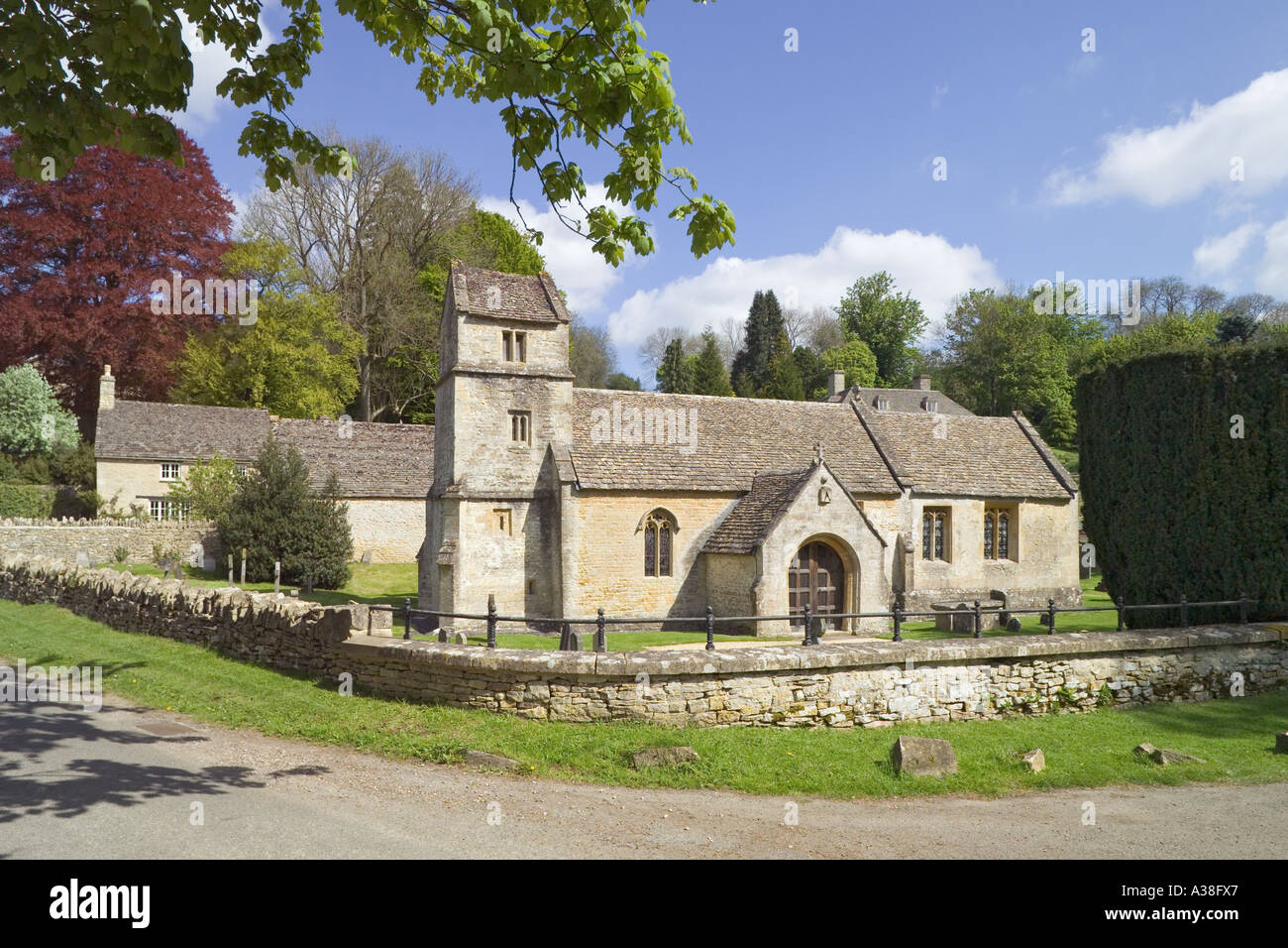 St Margarets church in the Cotswold village of Bagendon ...