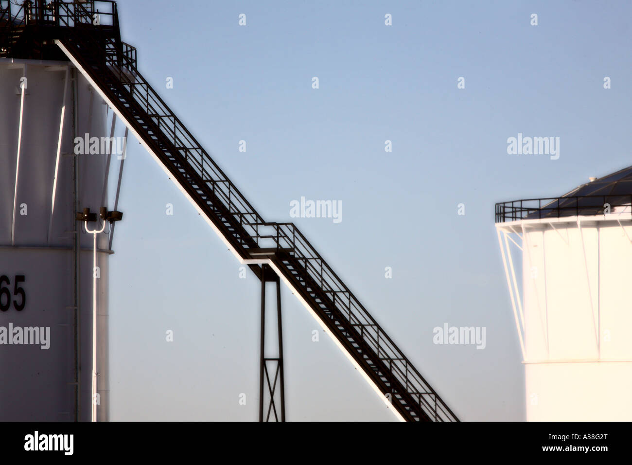 steel ladder leading to the top of storage tank Stock Photo - Alamy