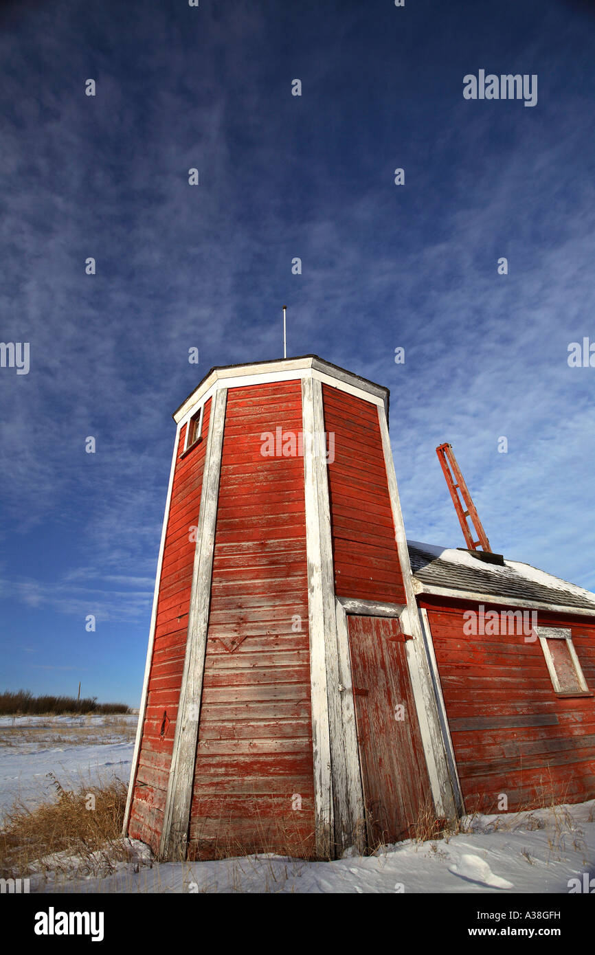 odd shaped red building in winter Stock Photo - Alamy