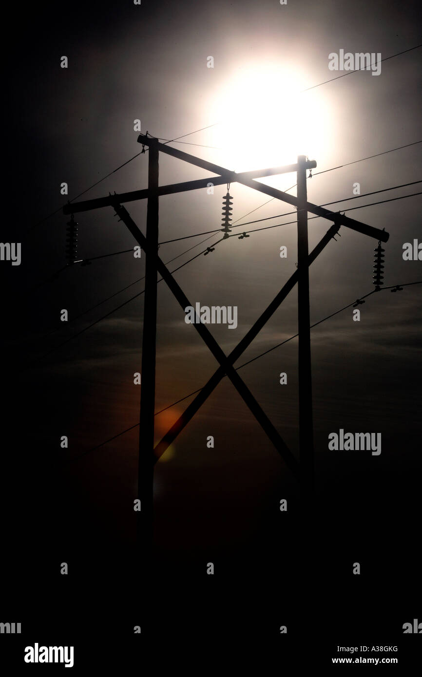 diffused sun seen against power pole Stock Photo - Alamy