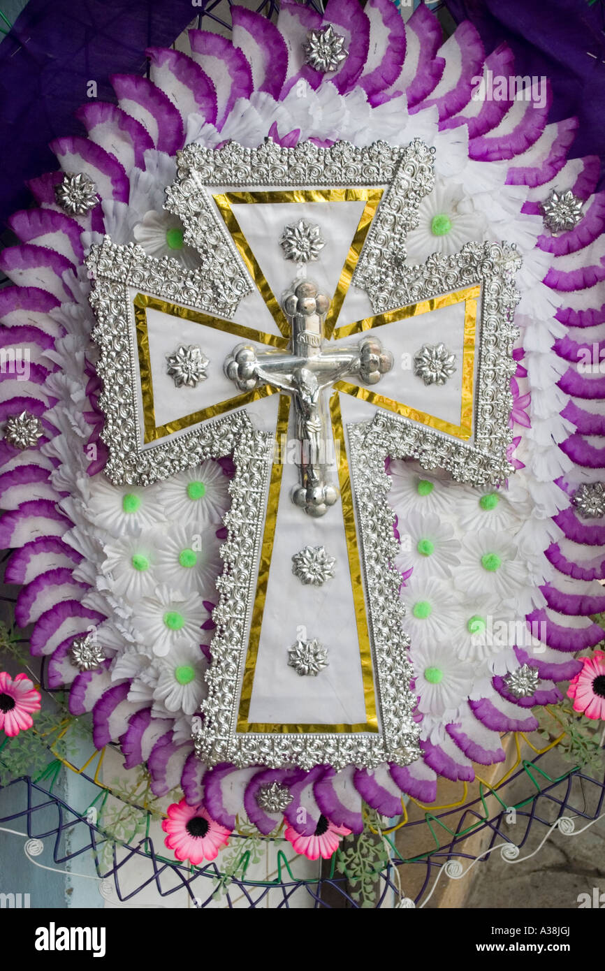 Crucifix funeral wreath in a Saigon shop Stock Photo - Alamy