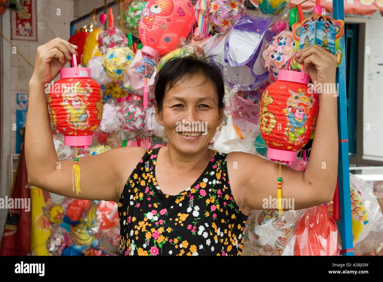 Woman stall holder in the street Saigon Stock Photo - Alamy