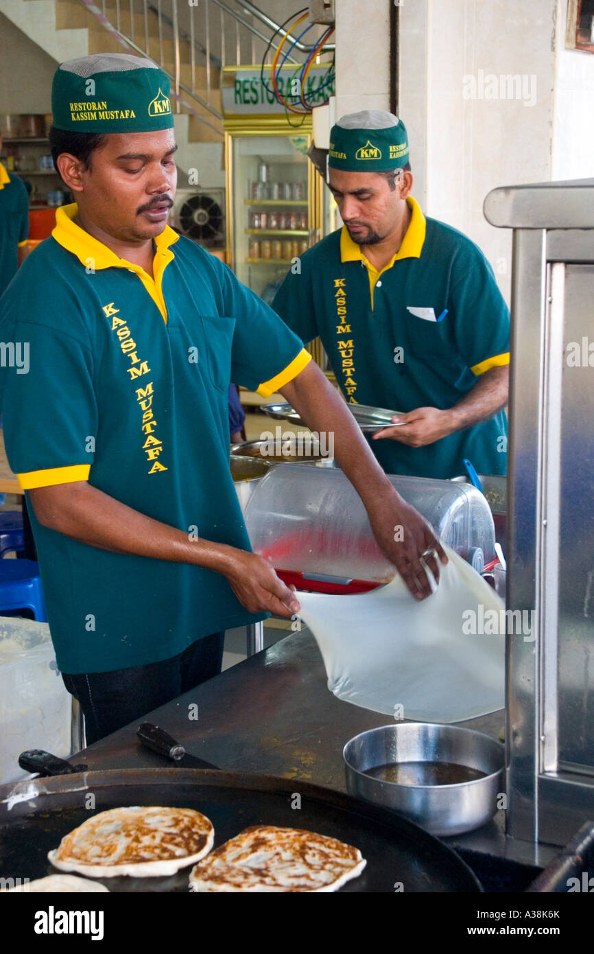 Men making roti canai chennai in Georgetown Penang Stock Photo - Alamy