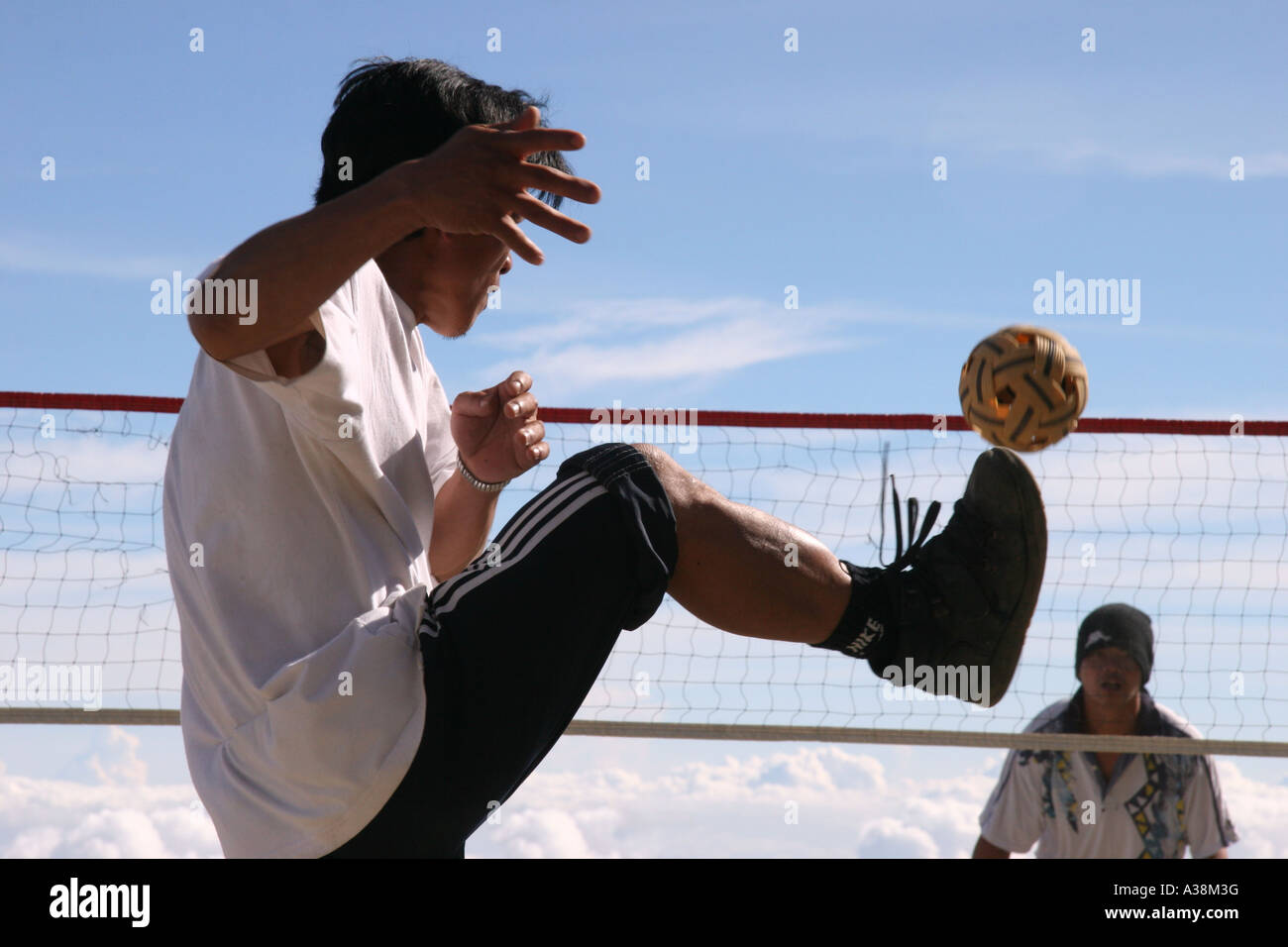 Mountain guides playing a game of takraw at Laban Rata on Mt Kinabalu ...