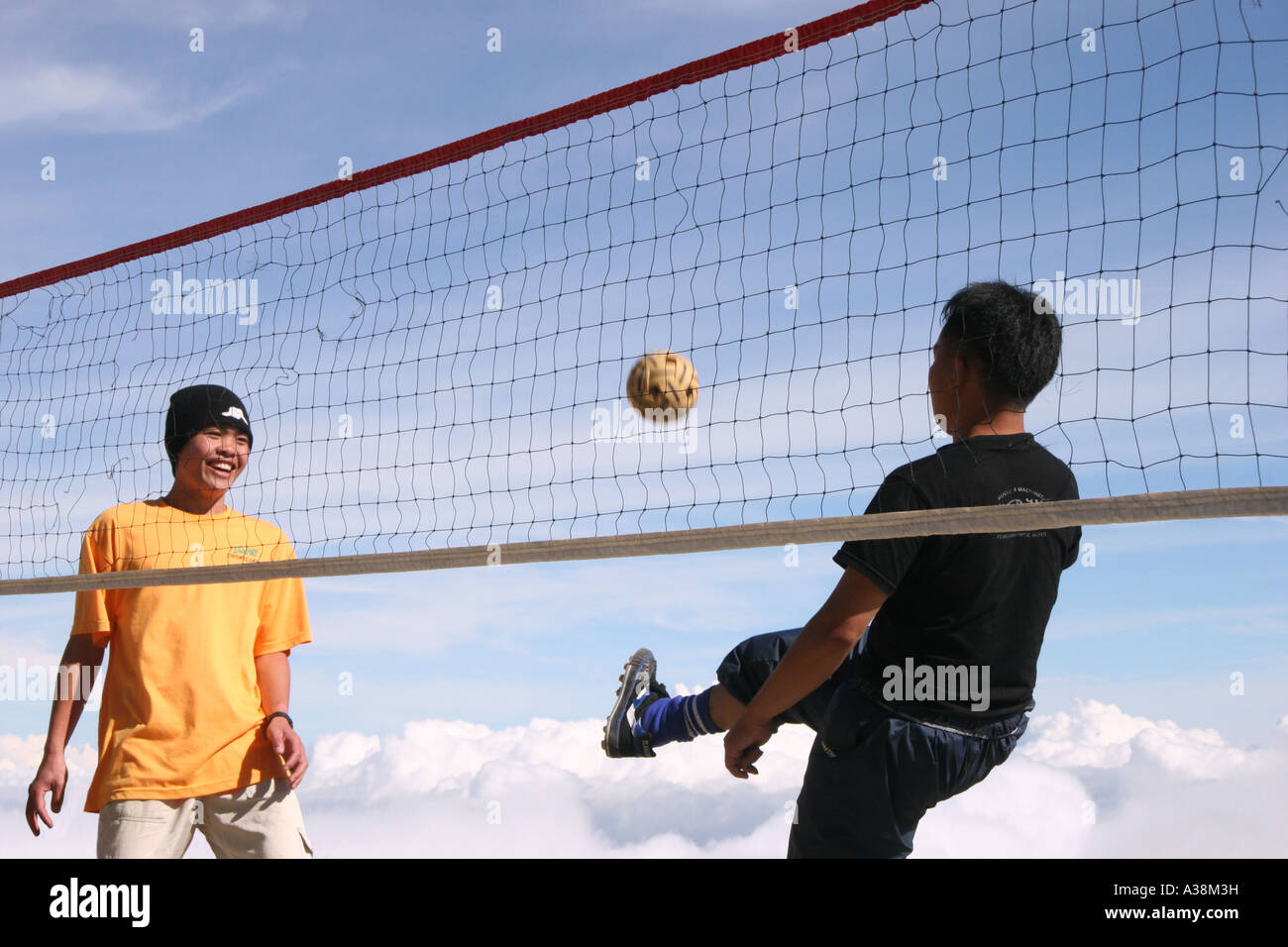 Mountain guides playing a game of takraw at Laban Rata on Mt Kinabalu ...
