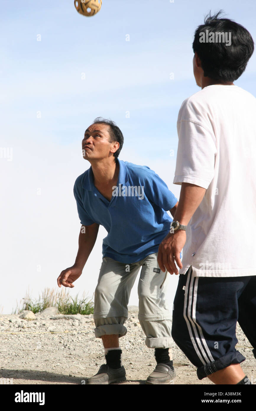 Mountain guides playing a game of takraw at Laban Rata on Mt Kinabalu ...