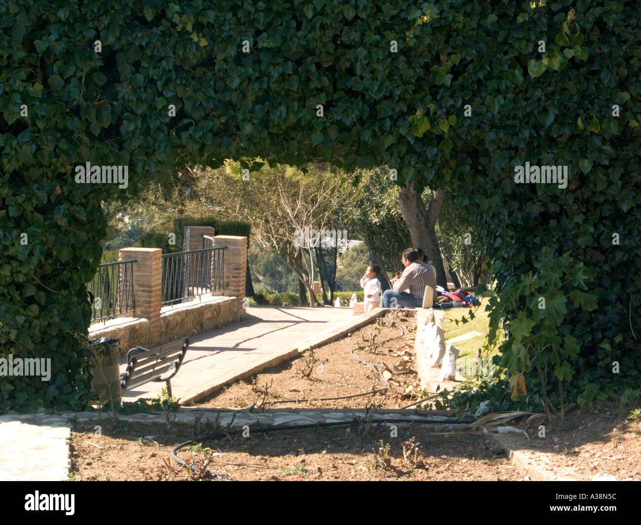 Mixed race family in the park, Mijas Pueblo, Andalucia, Spain, Europe ...