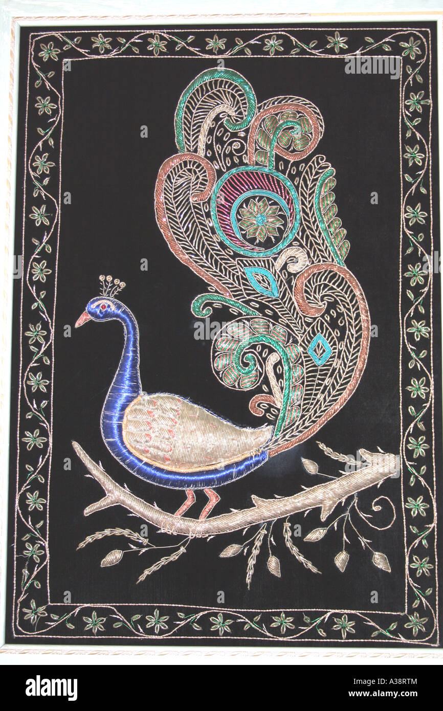 Embroidered peacock design tapestry Stock Photo - Alamy