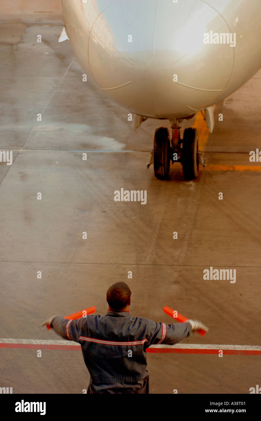 Airport ground crew signal hi-res stock photography and images - Alamy