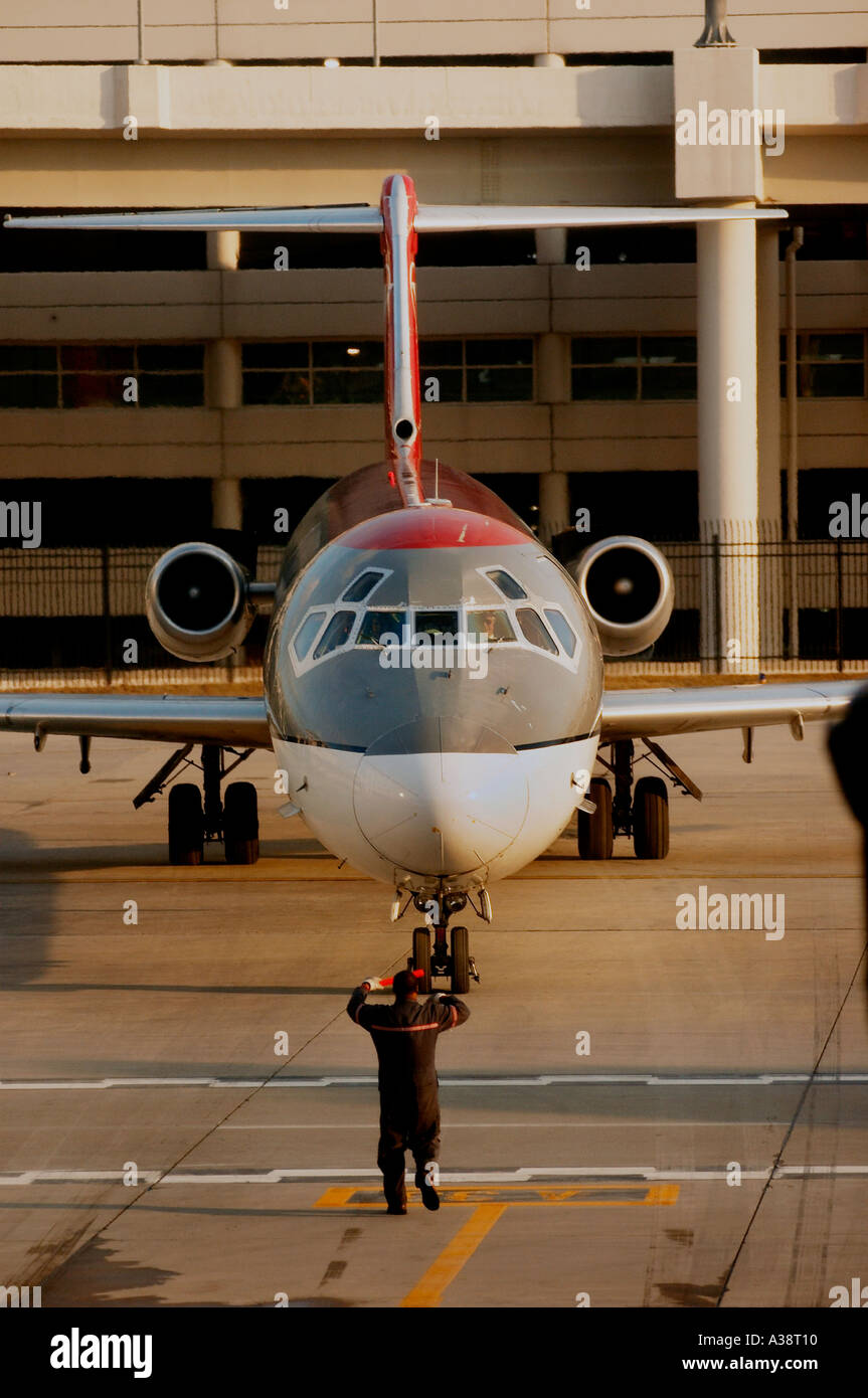 Ground crewman directing an aircraft before takeoff Stock Photo - Alamy