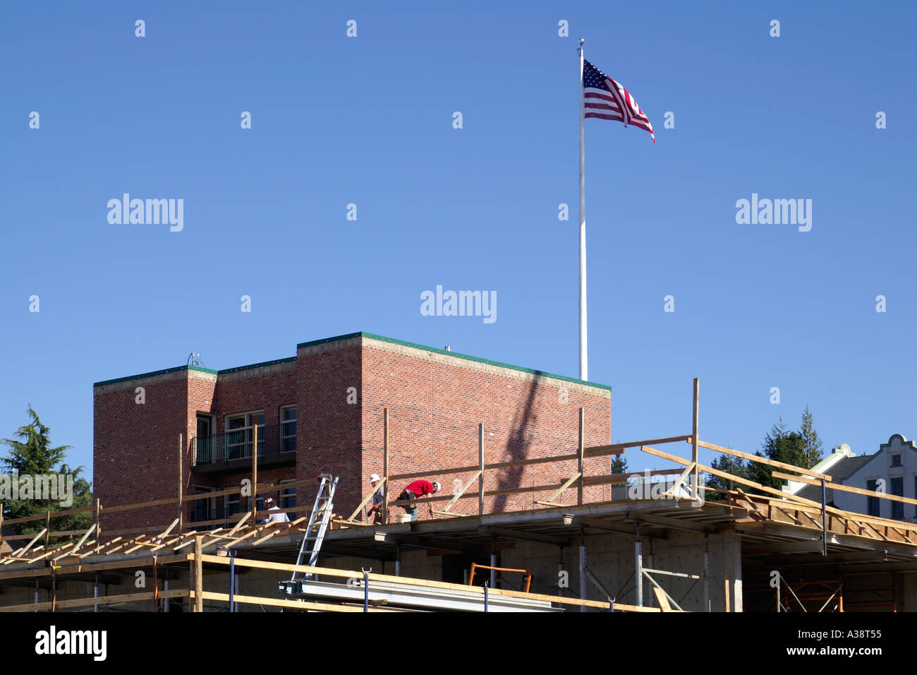 U S flag flying over construction site in Bellingham Washington state ...