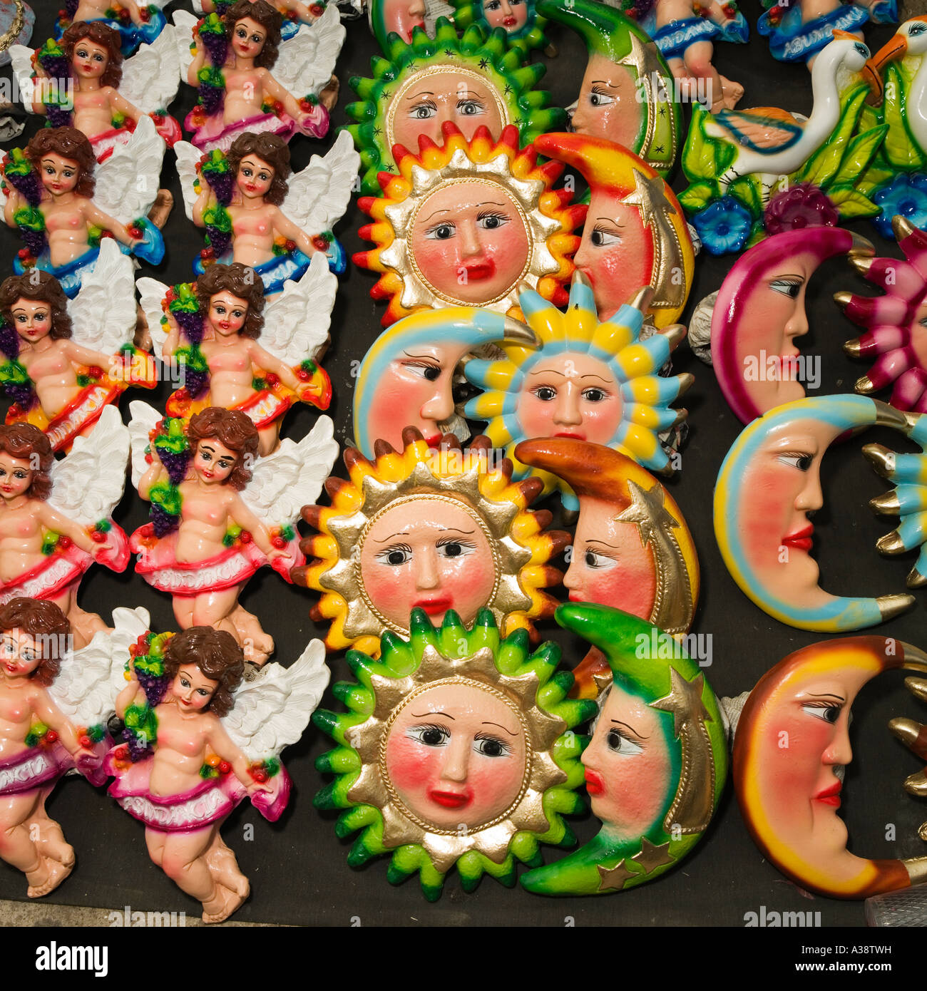 Plaster angels and other characters on sale at an outdoor market in ...