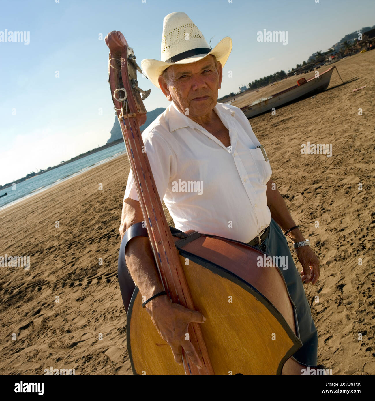 Mariachi Bass player on a beach on Stone Island Mazatlan Sinaloa Mexico ...