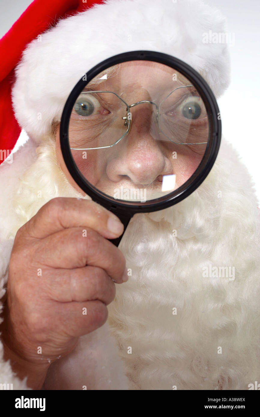 Santa claus with magnifying glass hi-res stock photography and images ...