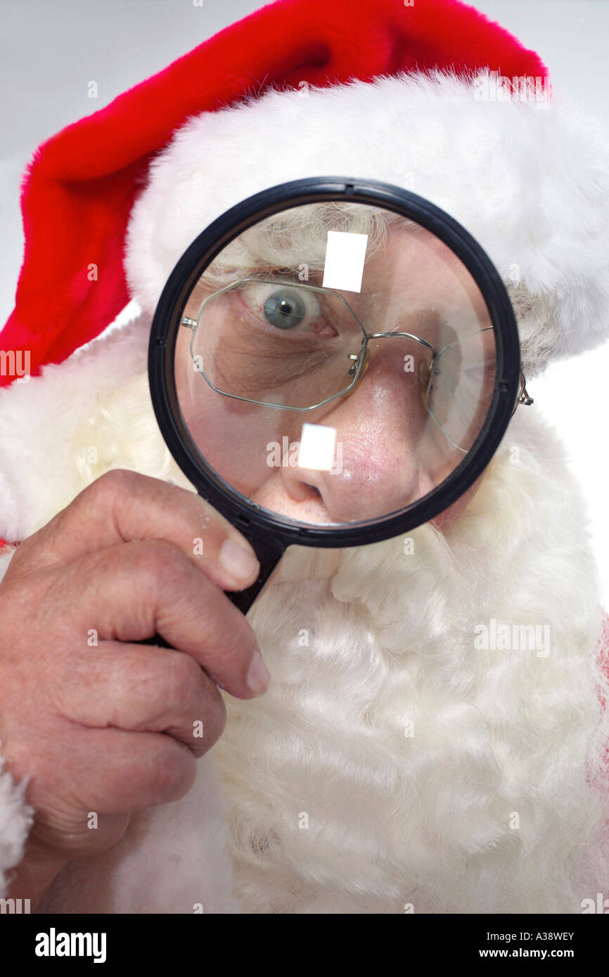 Nikolaus mit Lupe, Santa Claus with magnifying glass Stock Photo - Alamy