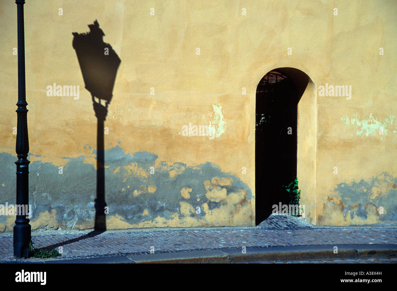 Street lamp shadow and doorway Stock Photo - Alamy