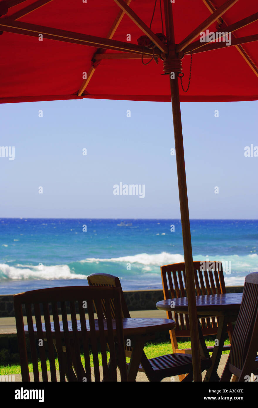 Patio set at ocean Stock Photo - Alamy