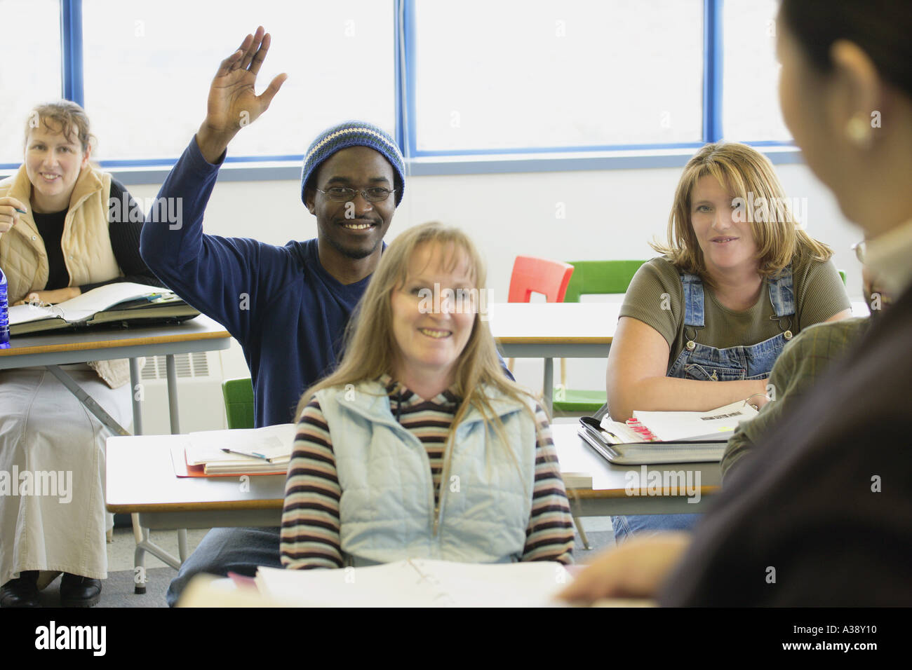 Adult students in class Stock Photo - Alamy