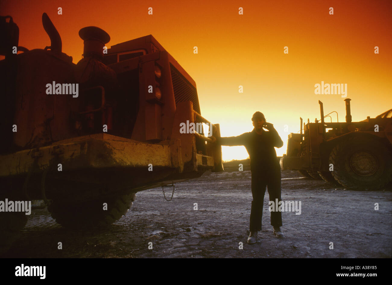 Early morning worker and vehicle Stock Photo - Alamy