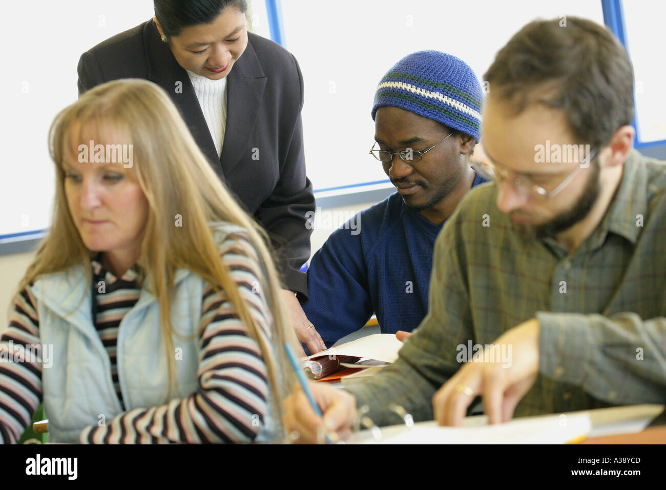 Adult students working Stock Photo - Alamy