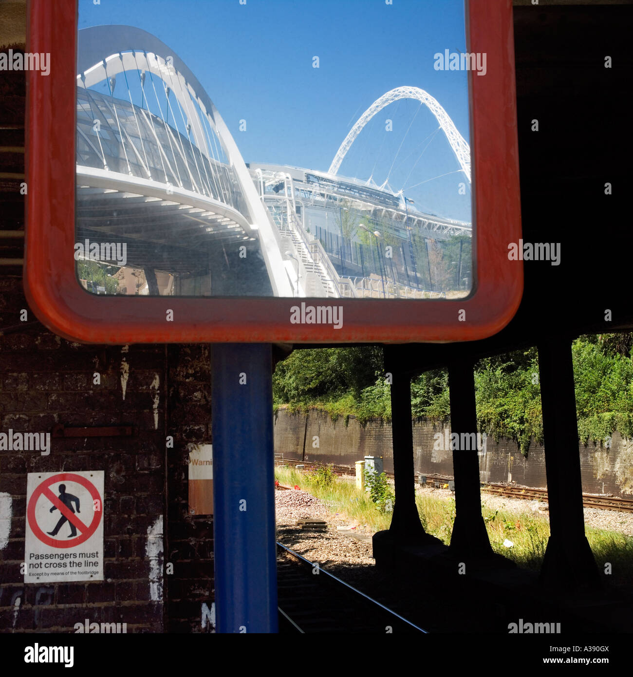 Reflection of Wembley Stadium and White Horse Bridge through a mirror ...