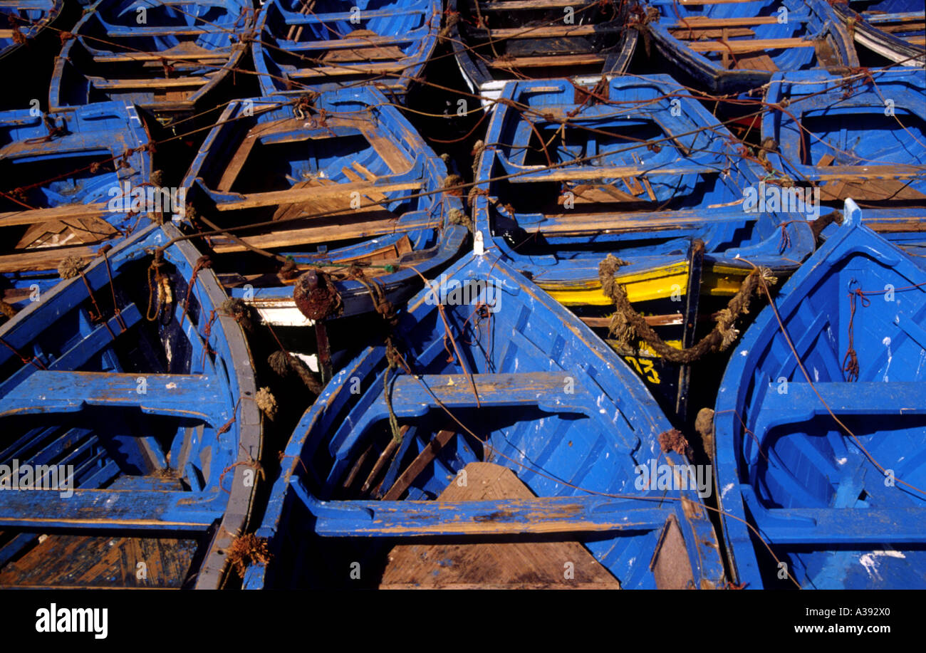 Wooden boats tied together hi-res stock photography and images - Alamy