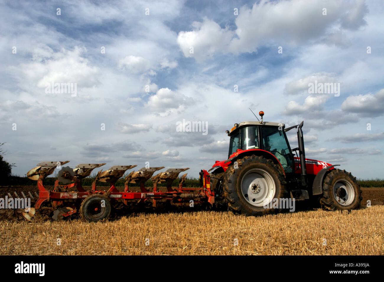 Tractor and Plough Stock Photo - Alamy
