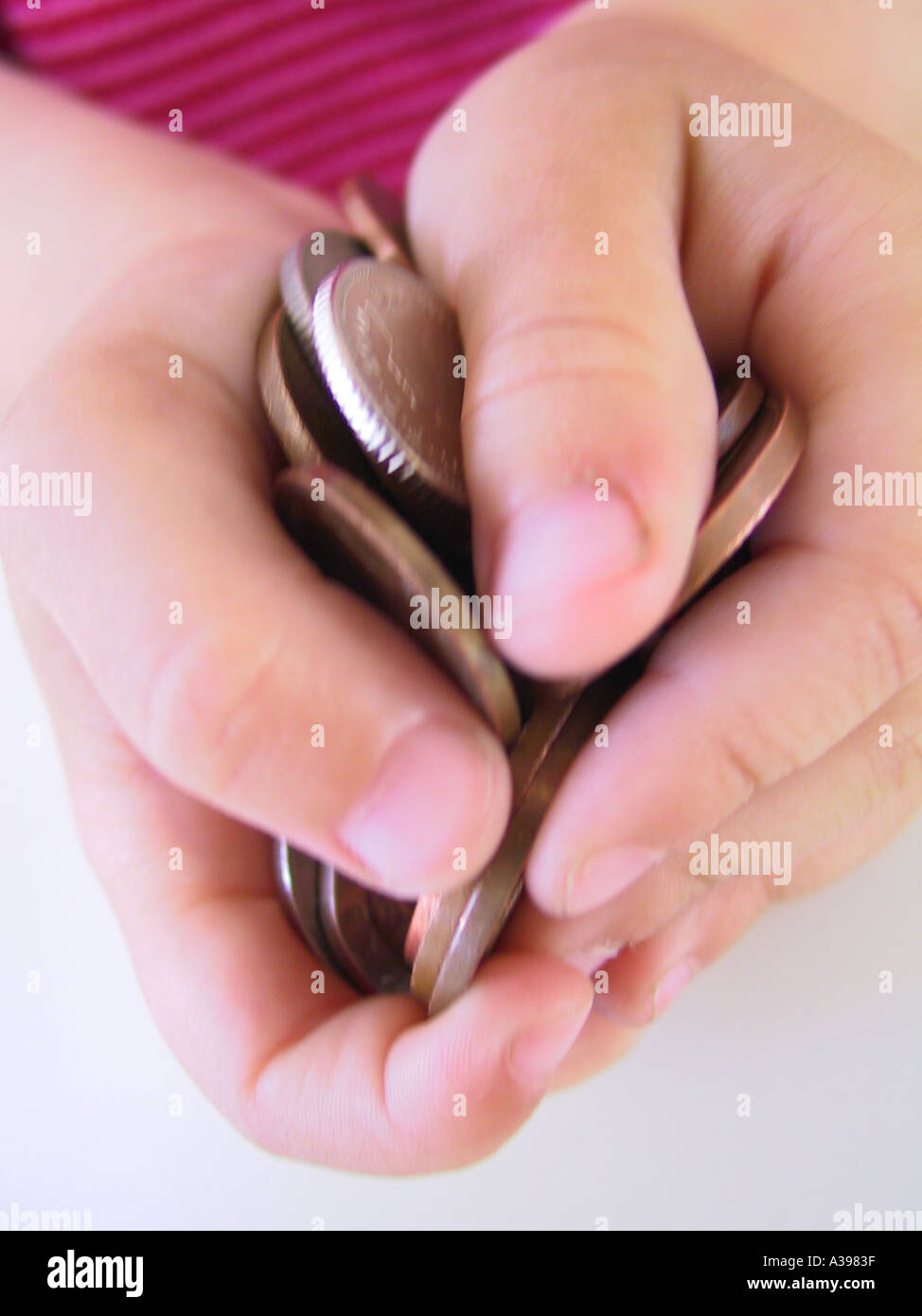 close up of two year old hands holding money Stock Photo - Alamy