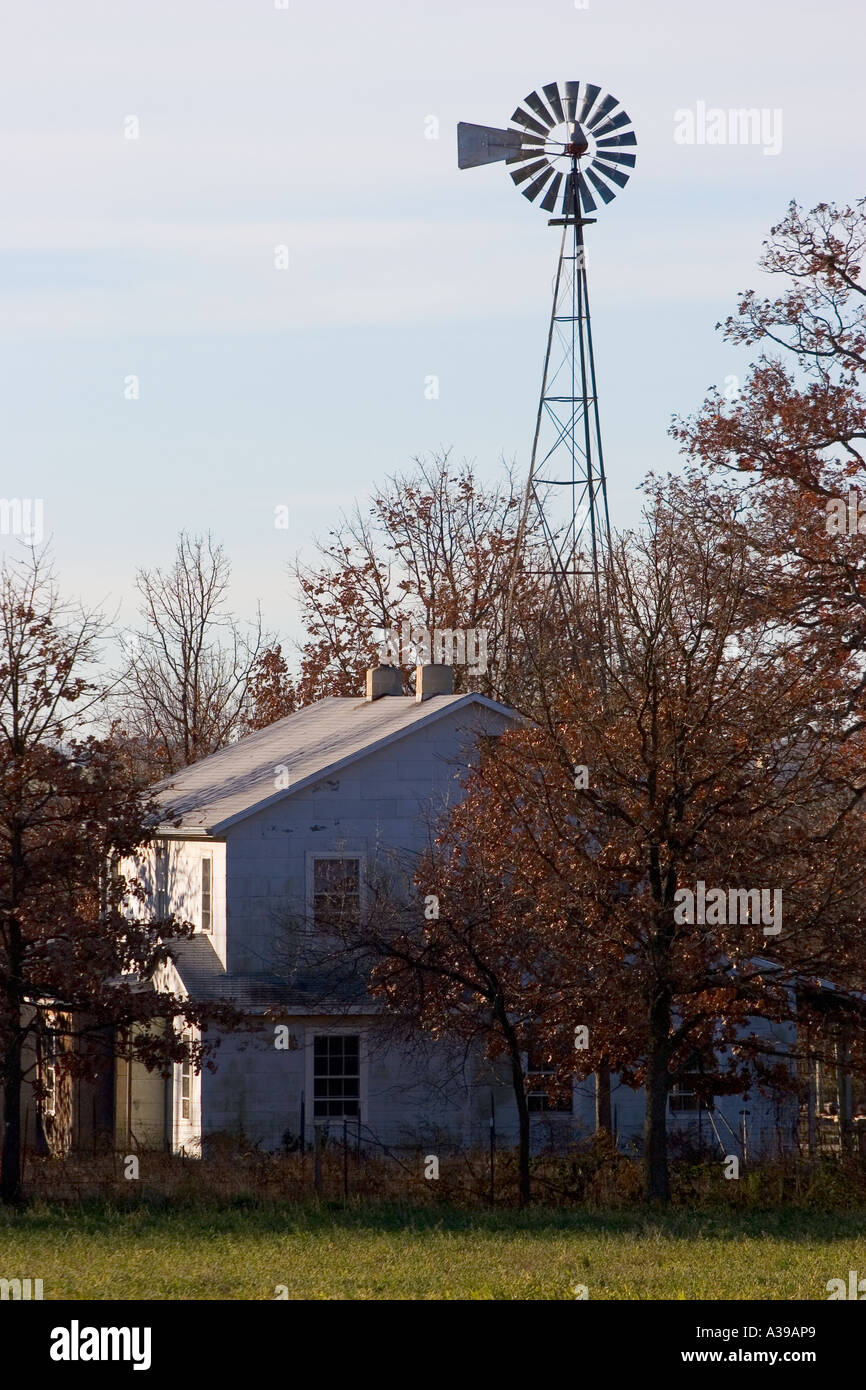 Amish farm house and windmill in early morning light Stock Photo - Alamy
