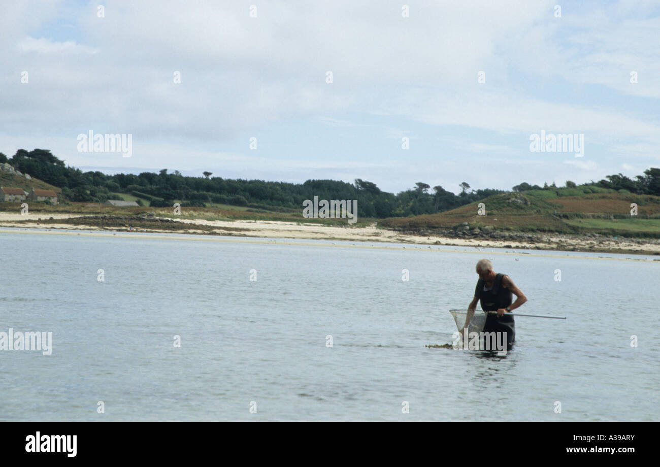 Islander shrimping at Bryher Island Scilly Islands Cornwall England UK ...